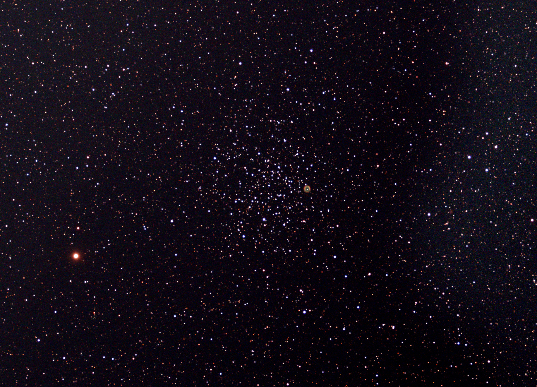 M46 -- star cluster and planetary nebula in Puppis